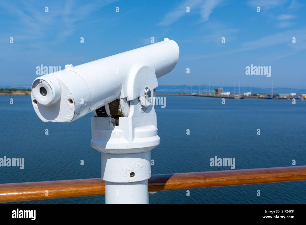 Telescope looking at the horizon on the deck of a ship Stock Photo - Alamy