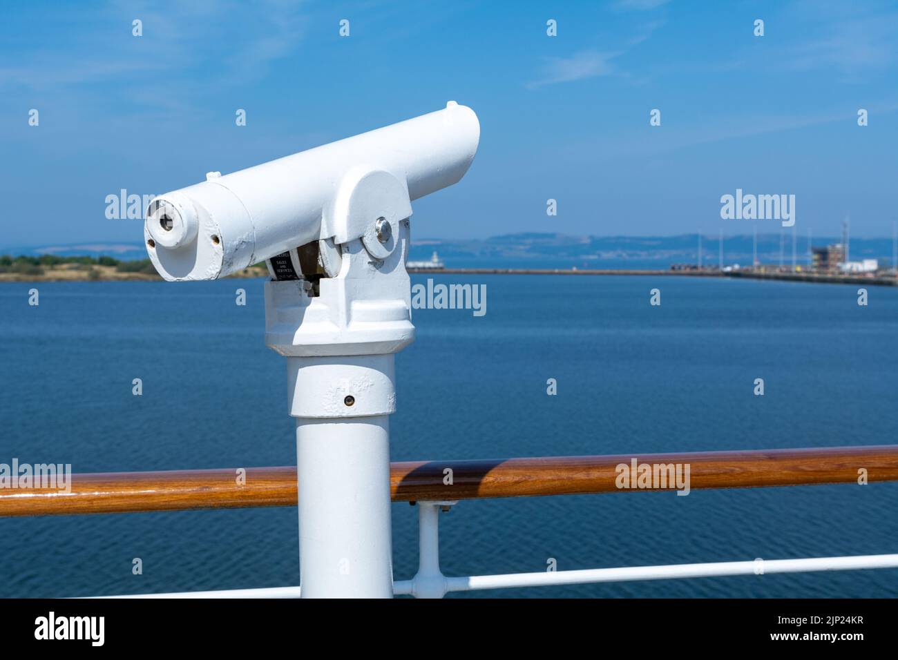 Telescope looking at the horizon on the deck of a ship Stock Photo - Alamy