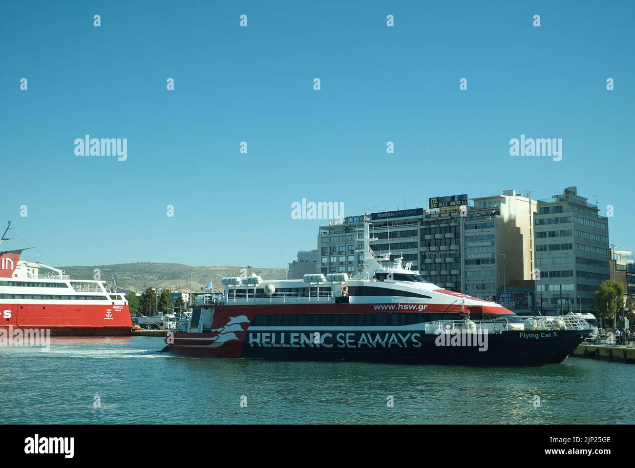 Ferry arriving in the port of Piraeus in Greece Stock Photo - Alamy