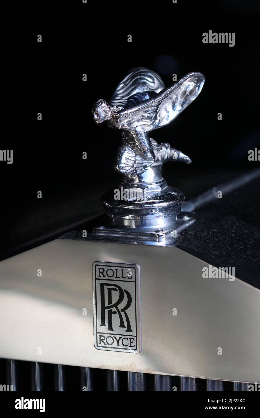 Spirit of Ecstasy bonet ornament and logo on radiator grille of classic ...