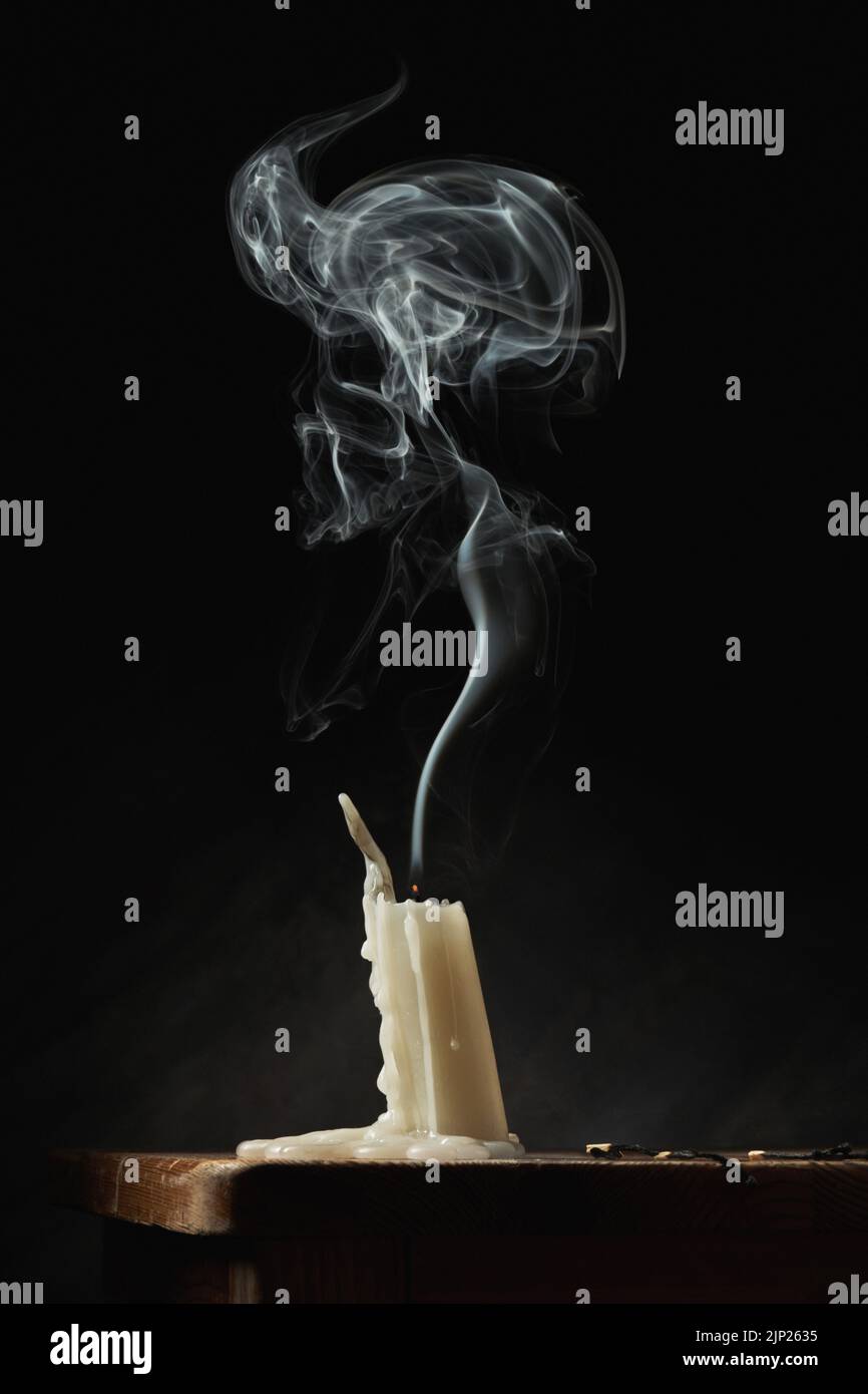 Extinguished candle hi-res stock photography and images - Alamy