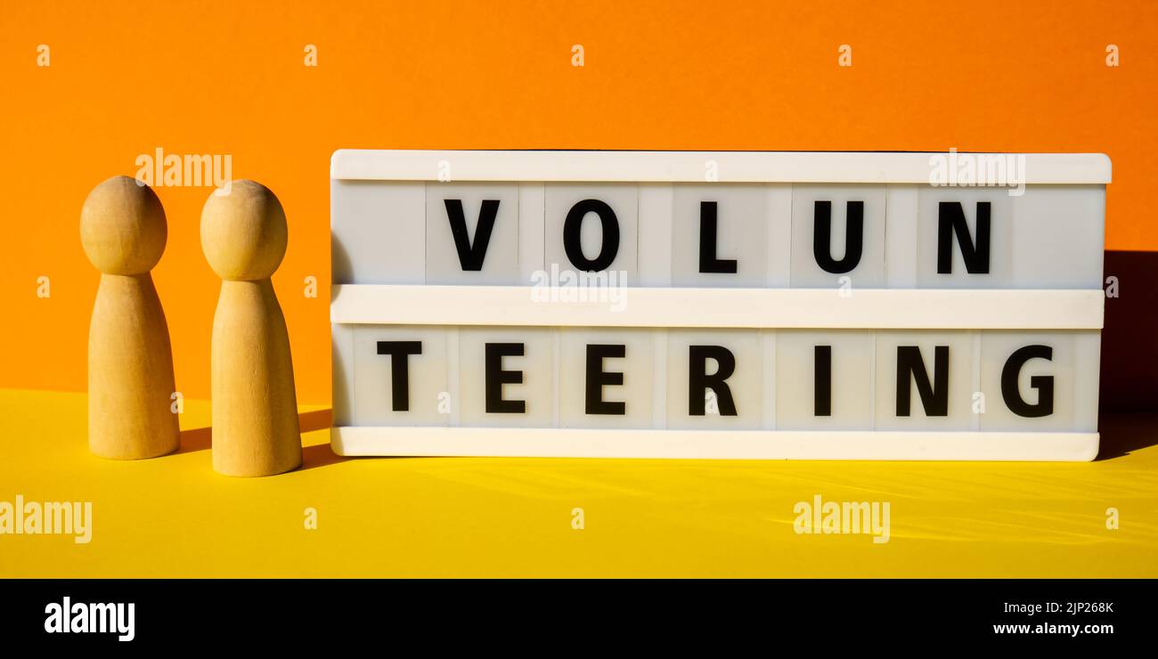 Lightbox with text VOLUNTEERING. Motivational Words Quotes Concept ...