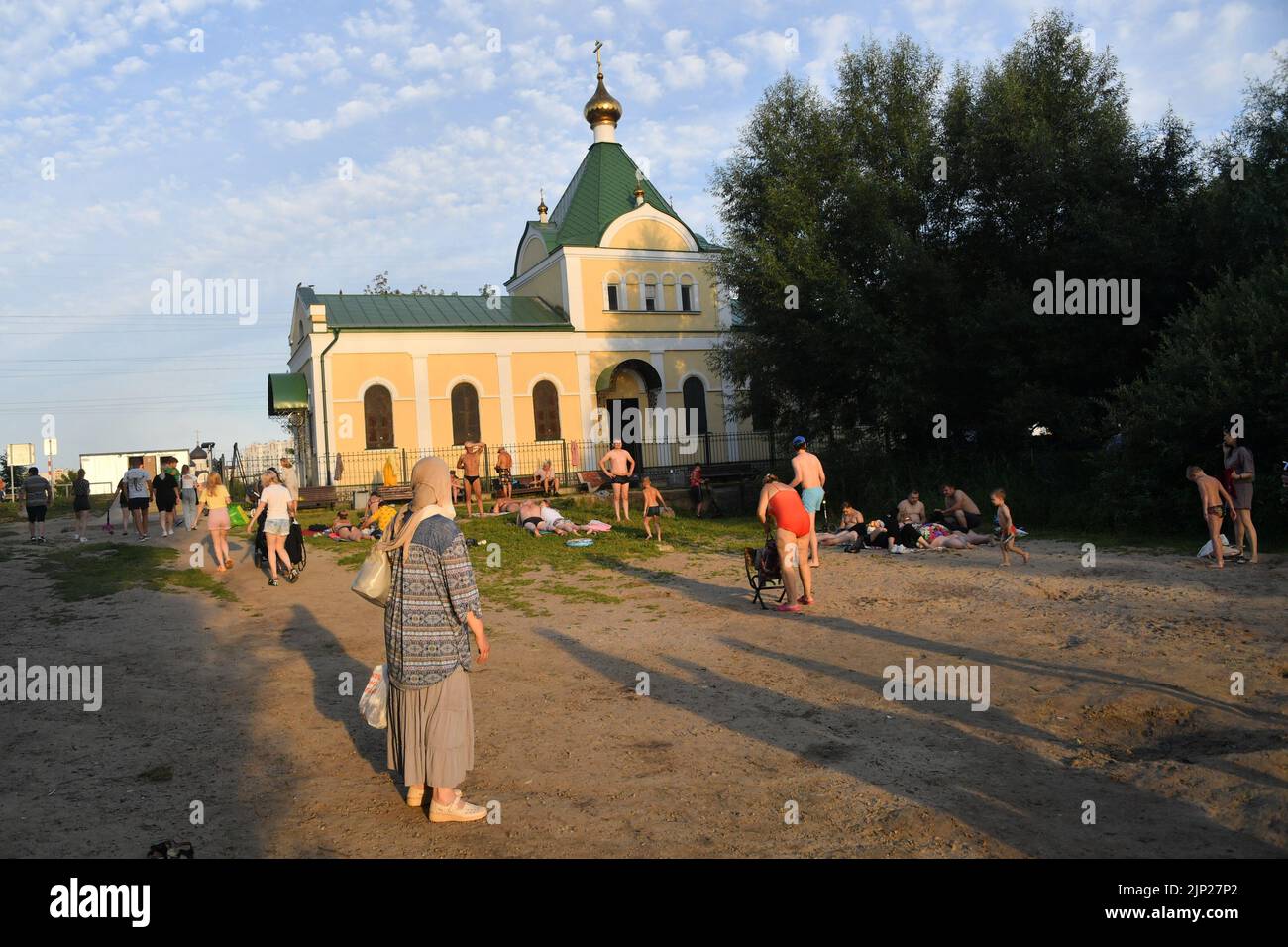 Moscow. Natural and historical Kosinsky park. People sunbathe at the ...