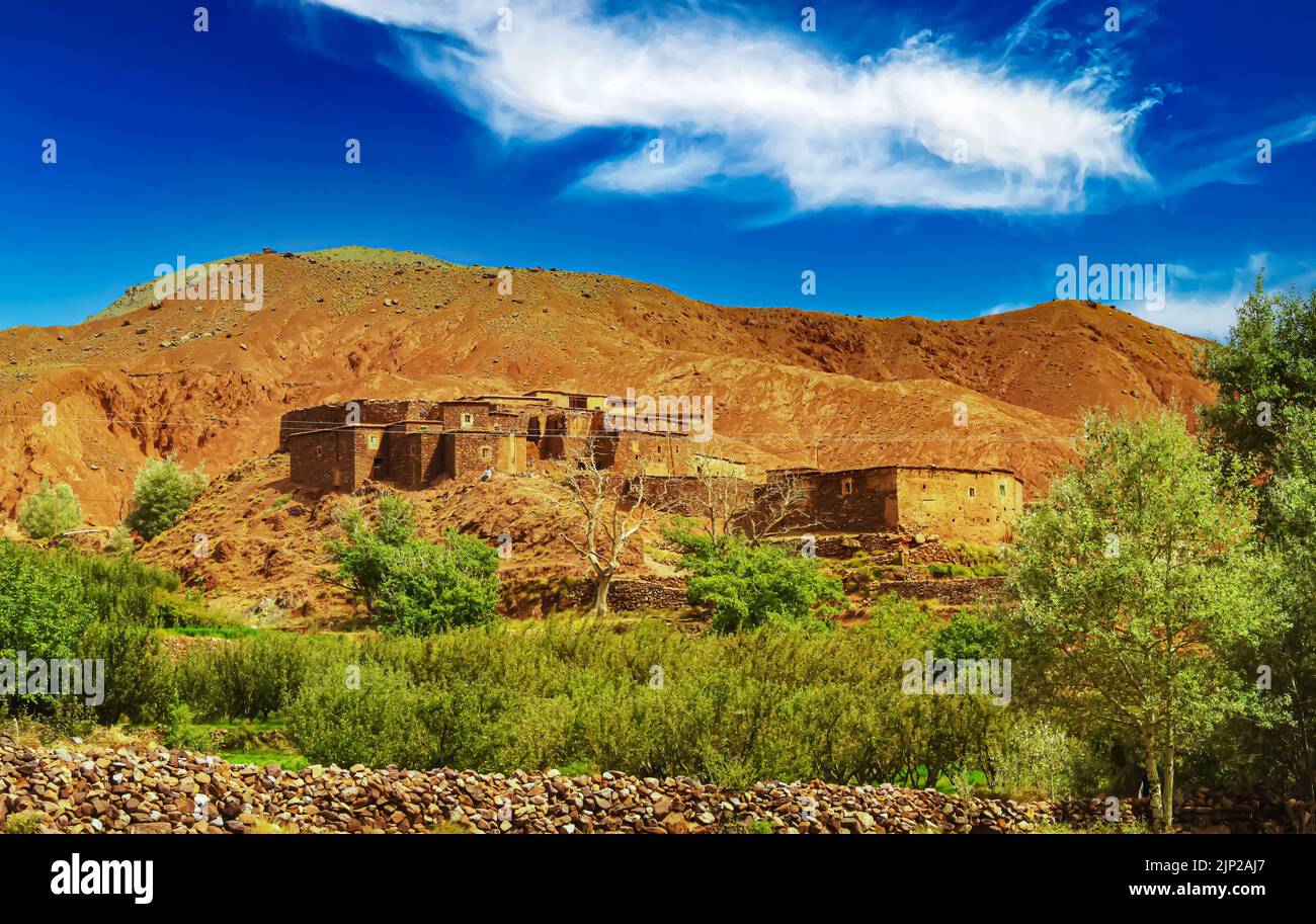 Beautiful moroccan landscape, typical idyllic small clay house village ...