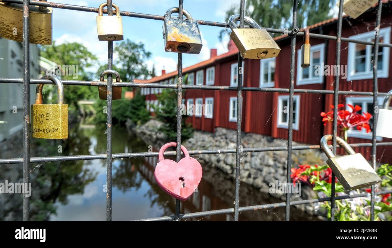 A historical bridge in Vasteras, Sweden, with lockers of different ...