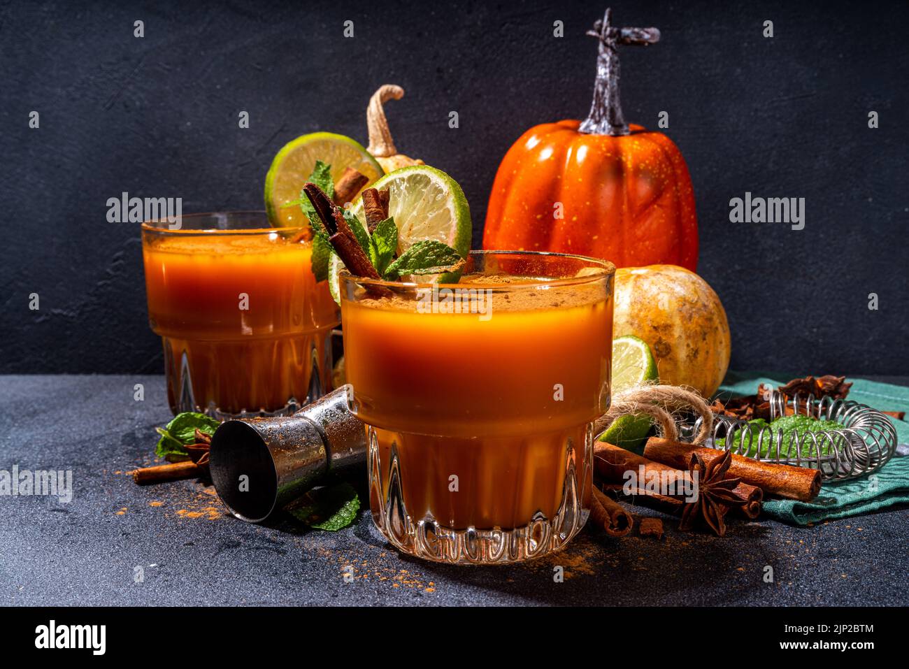 Spicy autumn pumpkin cocktail. Alcohol warming gin drink with pumpkin ...