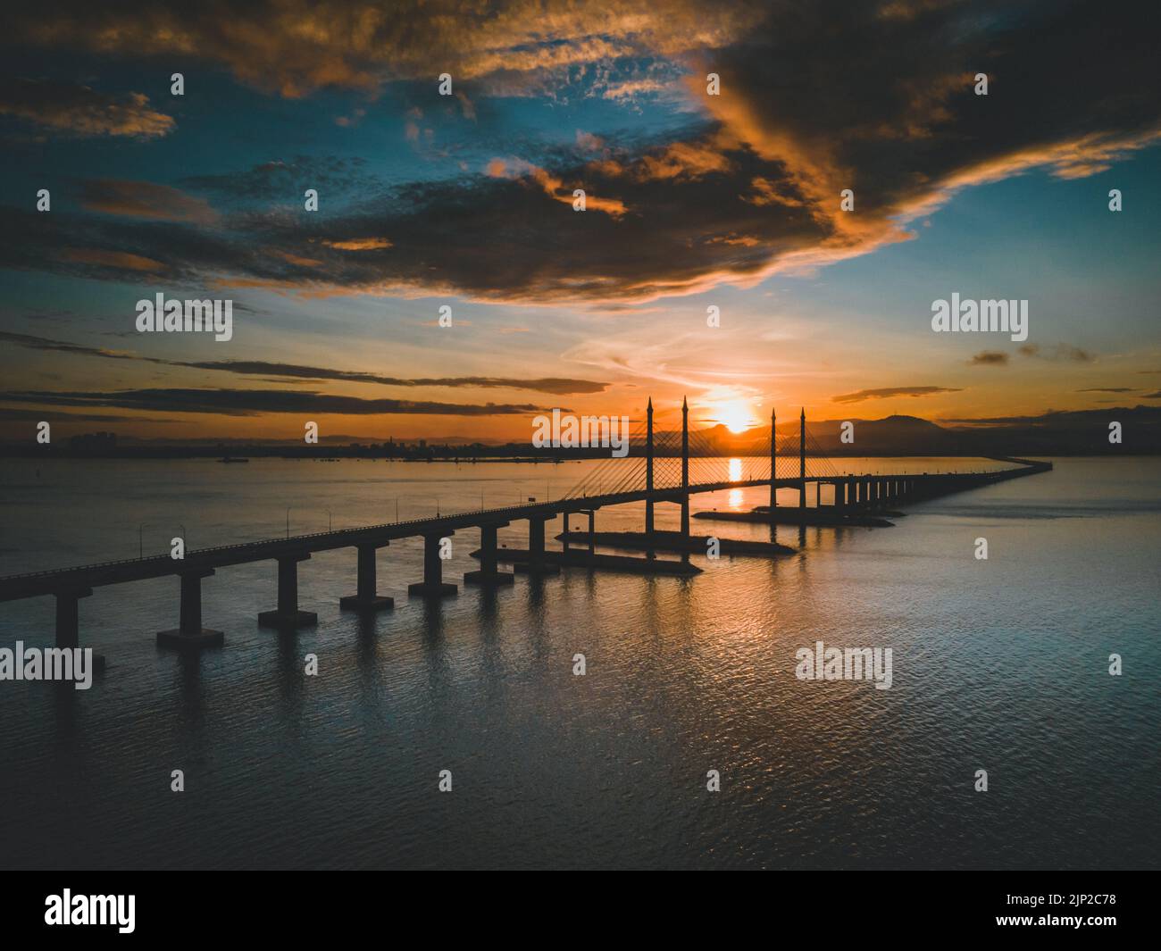 An aerial view of Penang Bridge in Malaysia during scenic sunset Stock ...