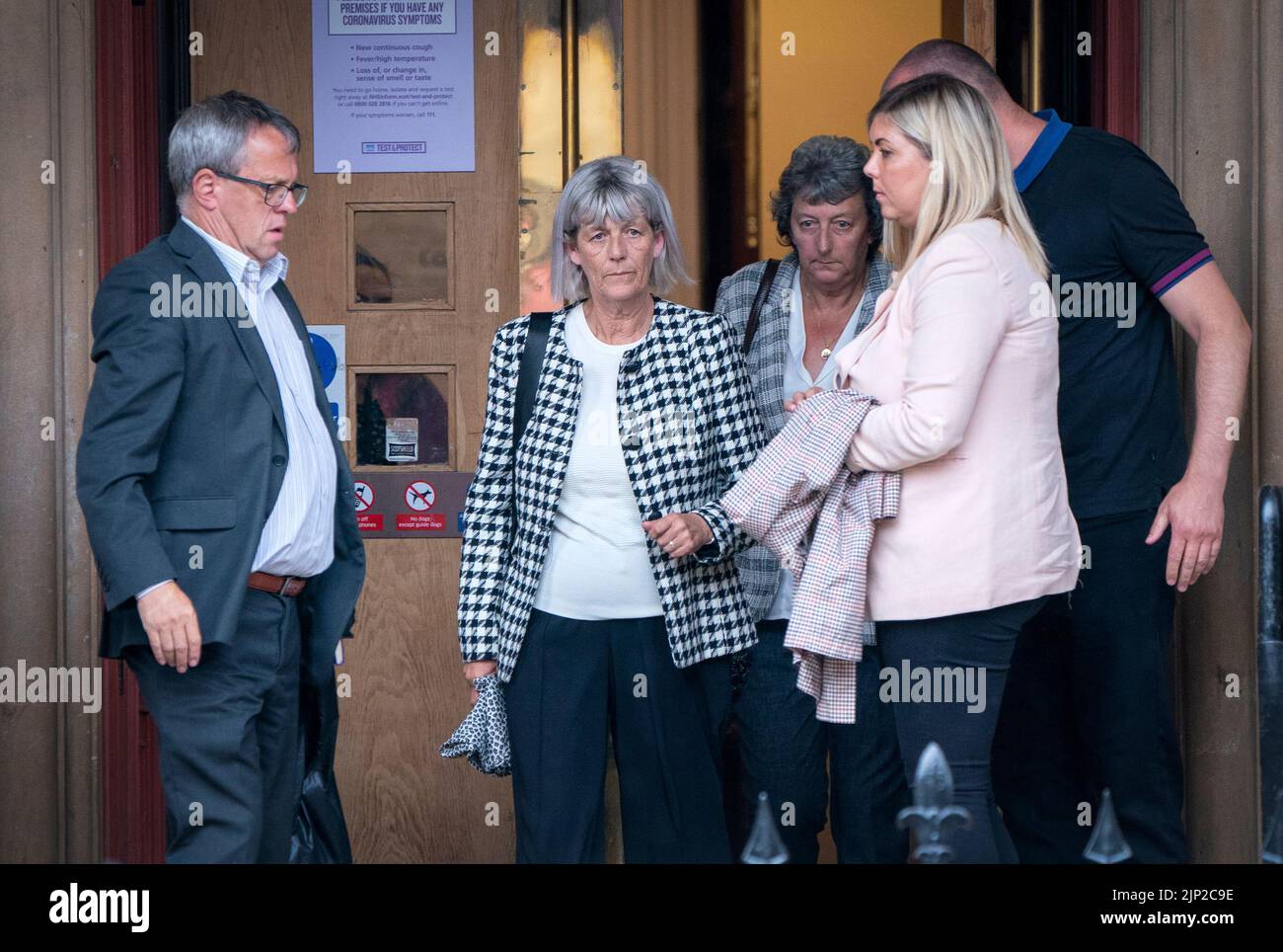 Jane Midgley (second left), mother of victim Simon Midgley, outside ...