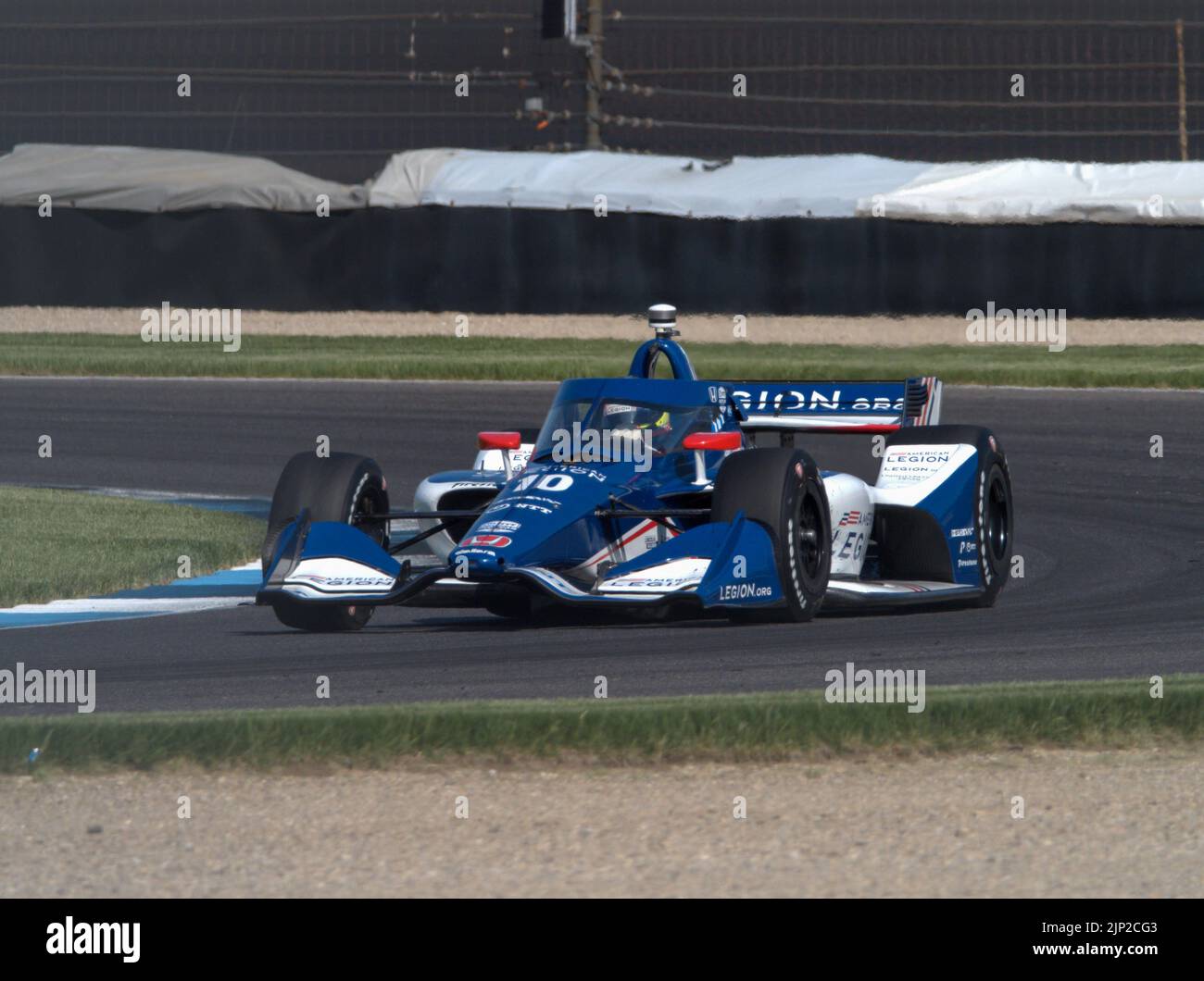 A blue Indycar during the Indianapolis Grand Prix qualifying ...