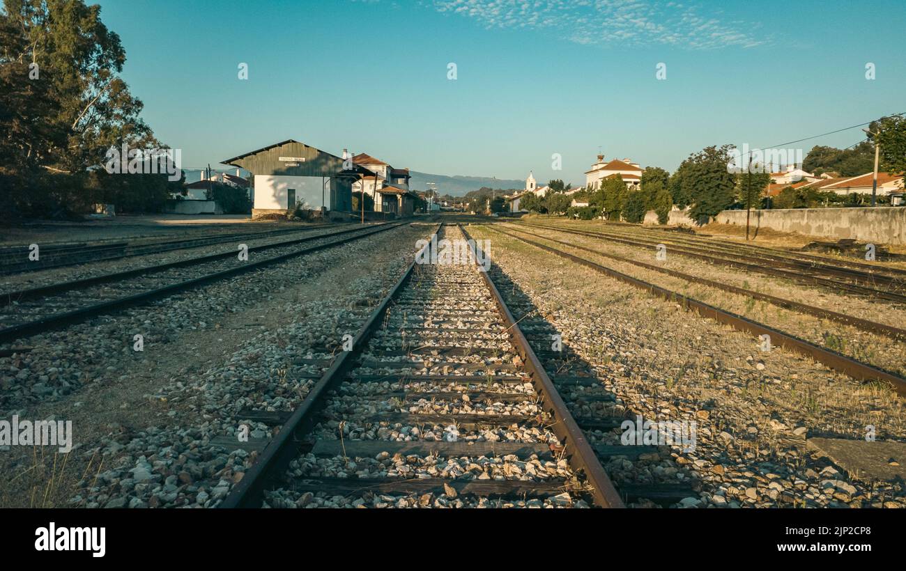 The rails of the old Beira train station in Portugal on a summer day ...