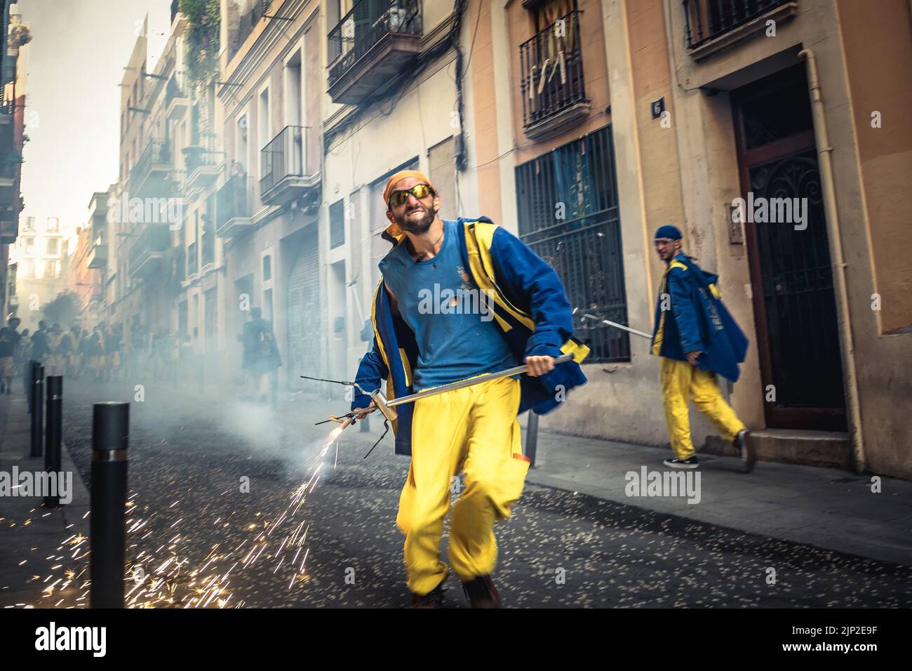 Barcelona, Spain. 15th Aug, 2022. Fire runners of the 'Diabolica de ...