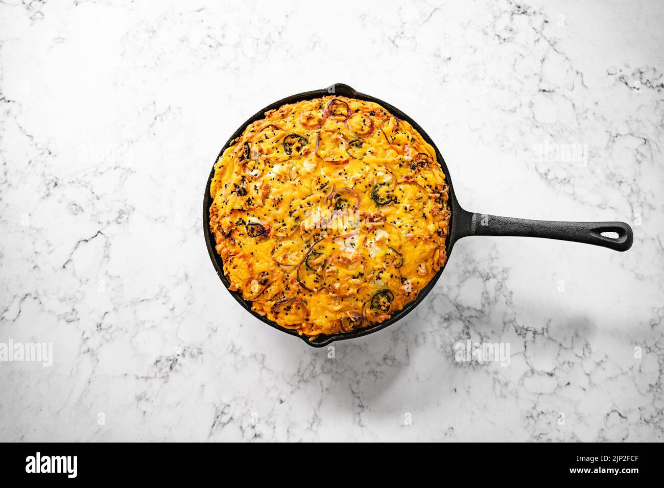 A closeup of delicious cornbread in a frying pan Stock Photo - Alamy