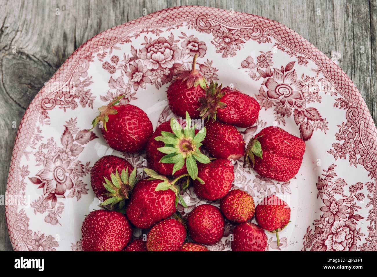 A closeup of ripe strawberries on a plate Stock Photo - Alamy