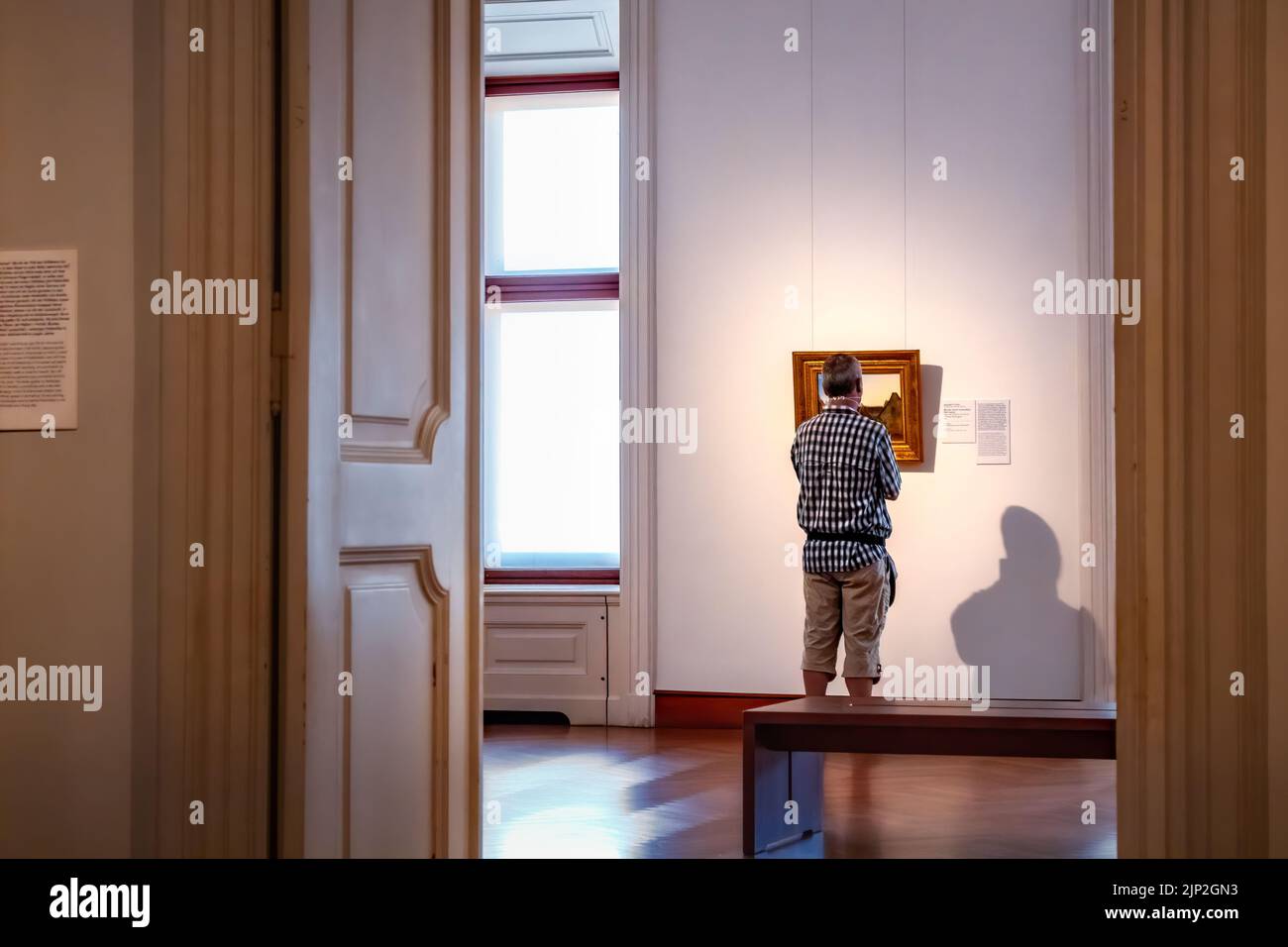 A man mesmerized by a painting in the Belvedere museum in Vienna - Art ...