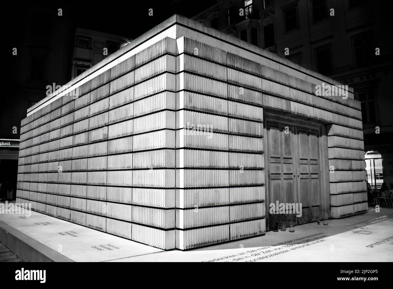 A grayscale shot of the Judenplatz Holocaust Memorial in Vienna ...