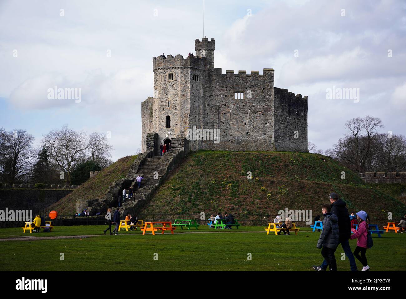 The Cardiff Castle with visitors exploring the area around it Stock ...