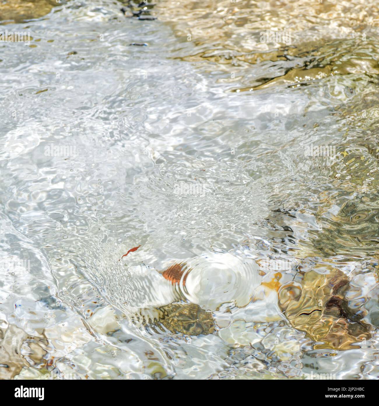 Moving water over marble pebble beach, Thassos, Macedonia, North ...