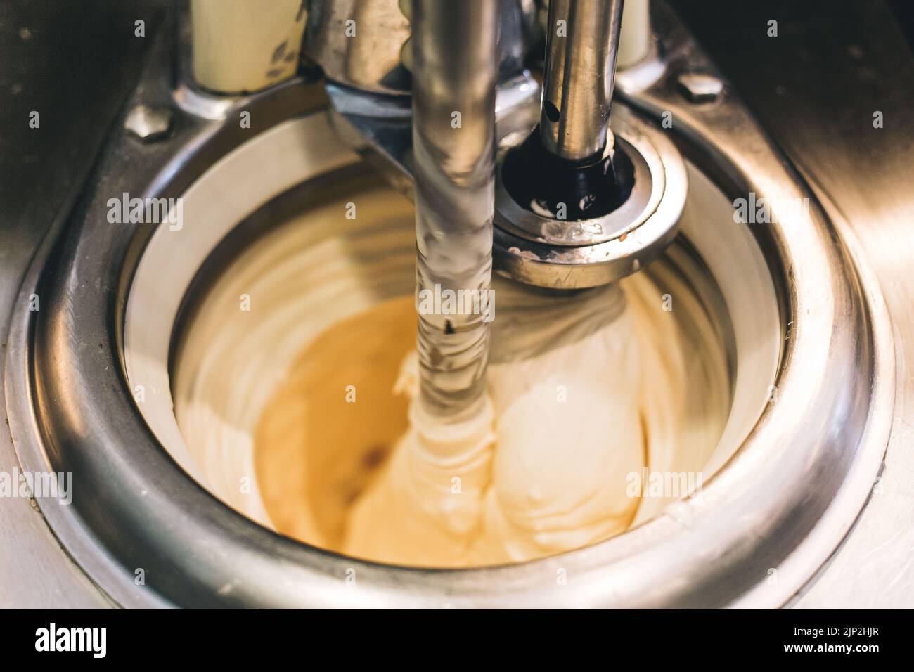 A Closeup of a Italian gelato making process with a white cream Stock ...