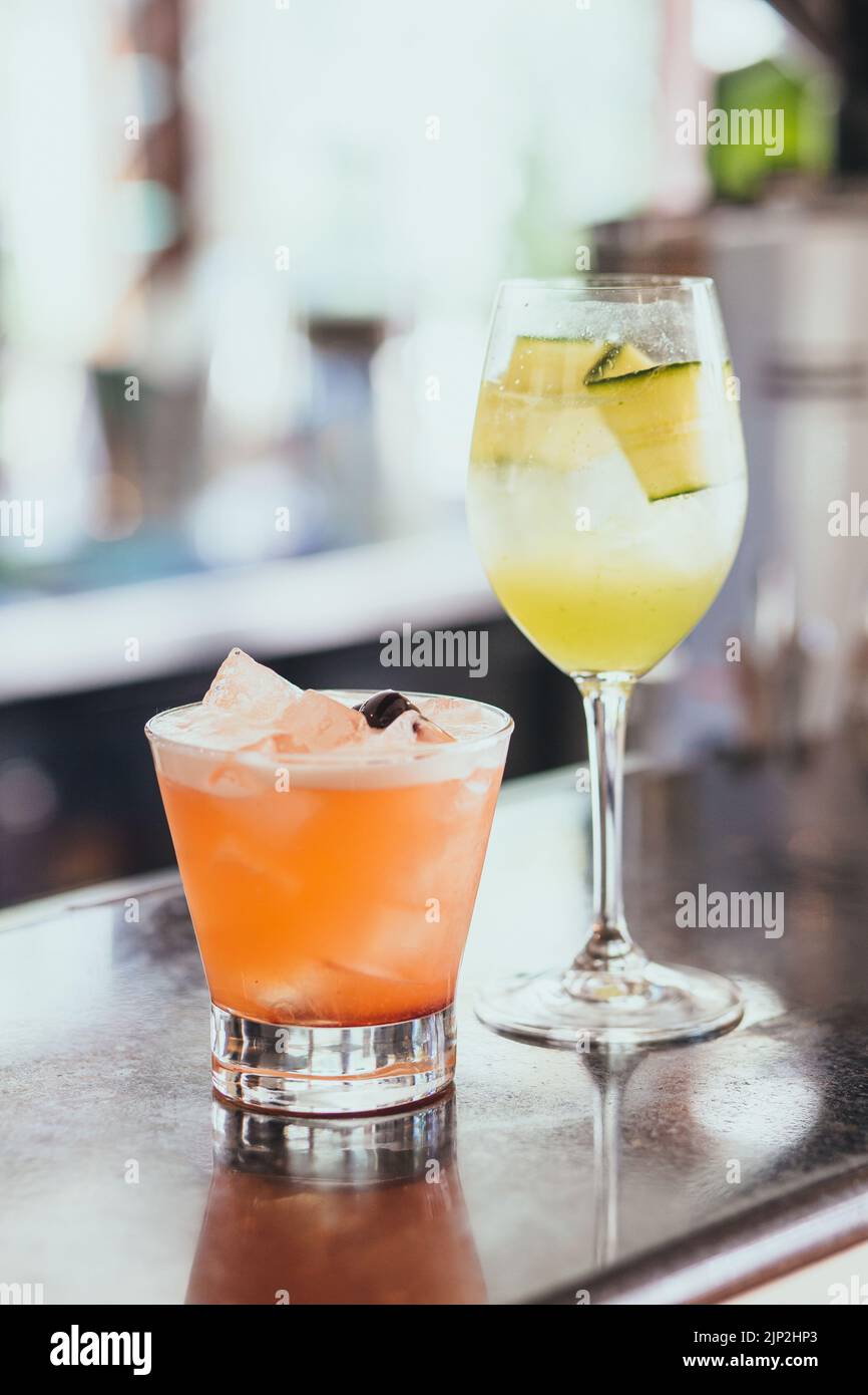 A Shallow focus of glass of cocktails on a bar Stock Photo - Alamy