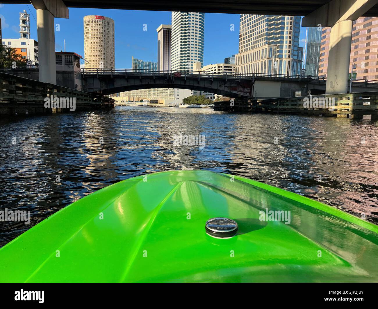 A cityscape from a green speed boat in a water Stock Photo - Alamy