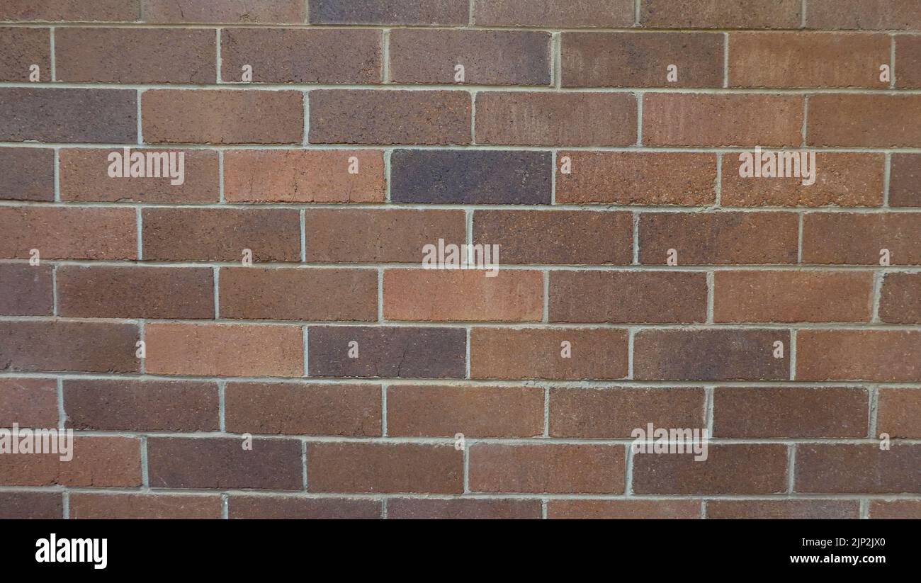 brick wall made with dark brown rectangle bricks Stock Photo - Alamy