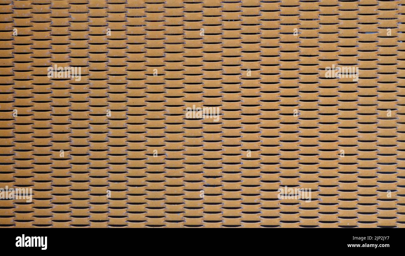 orange color expanded metal mesh wall background Stock Photo - Alamy