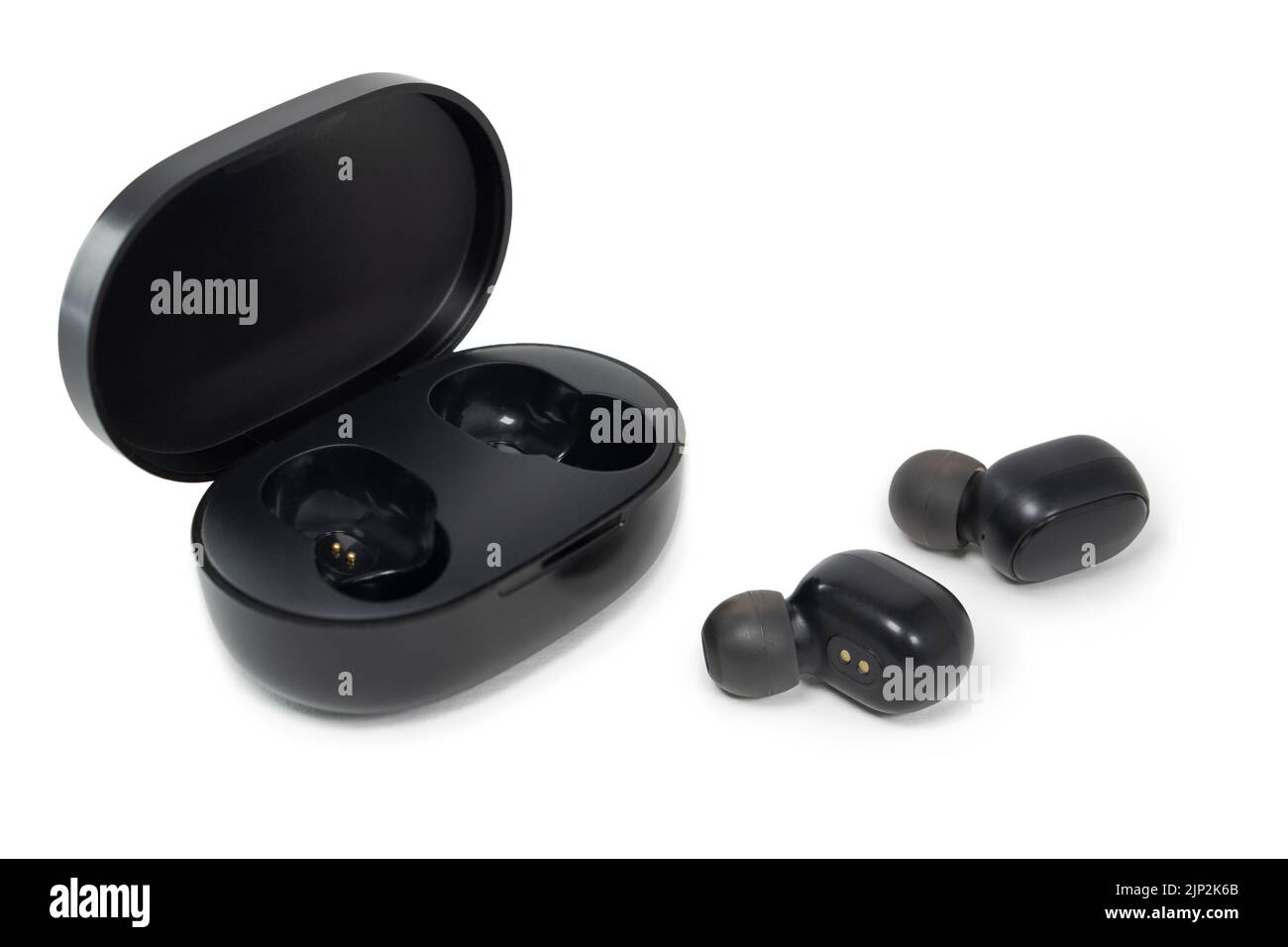 Wireless black bluetooth earphones with contactless charging isolated ...