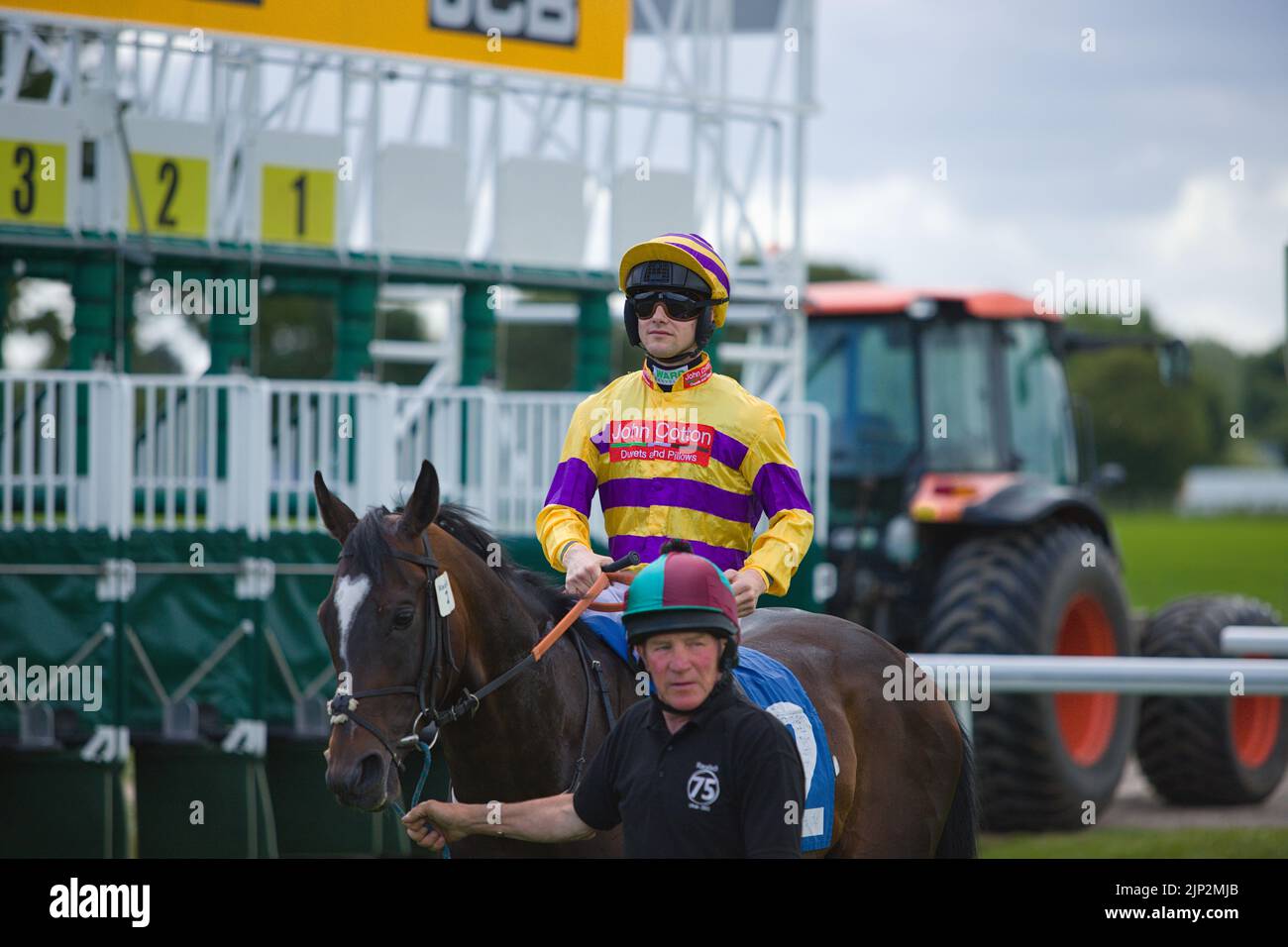 Jockey Jason Hart on Common Acclaim at York Races Stock Photo - Alamy