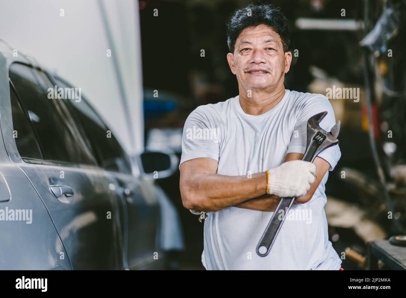 Asian male mechanic professional portrait happy smile work man in ...