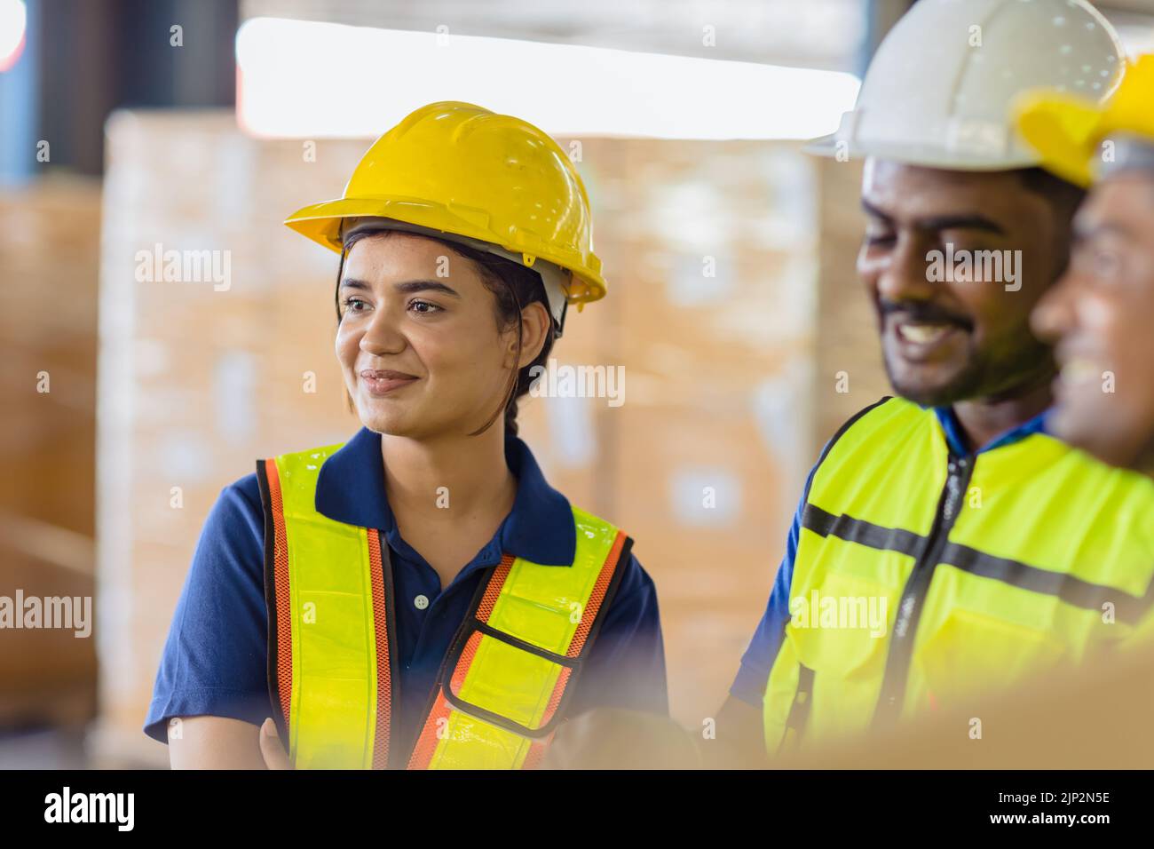 Industry cargo warehouse working woman work with male teamwork happy ...
