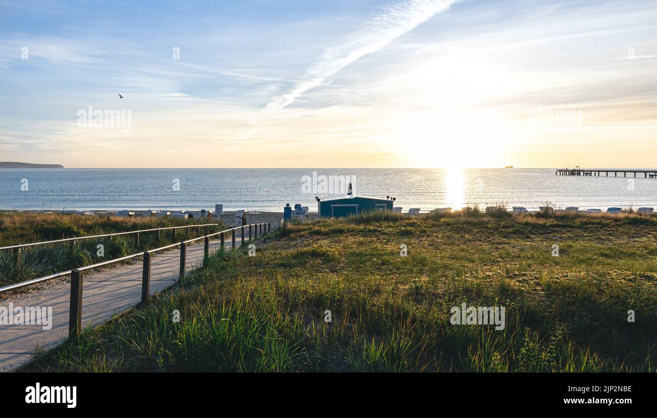 Sea embankment at sunset with a clear cloudless sky Stock Photo - Alamy