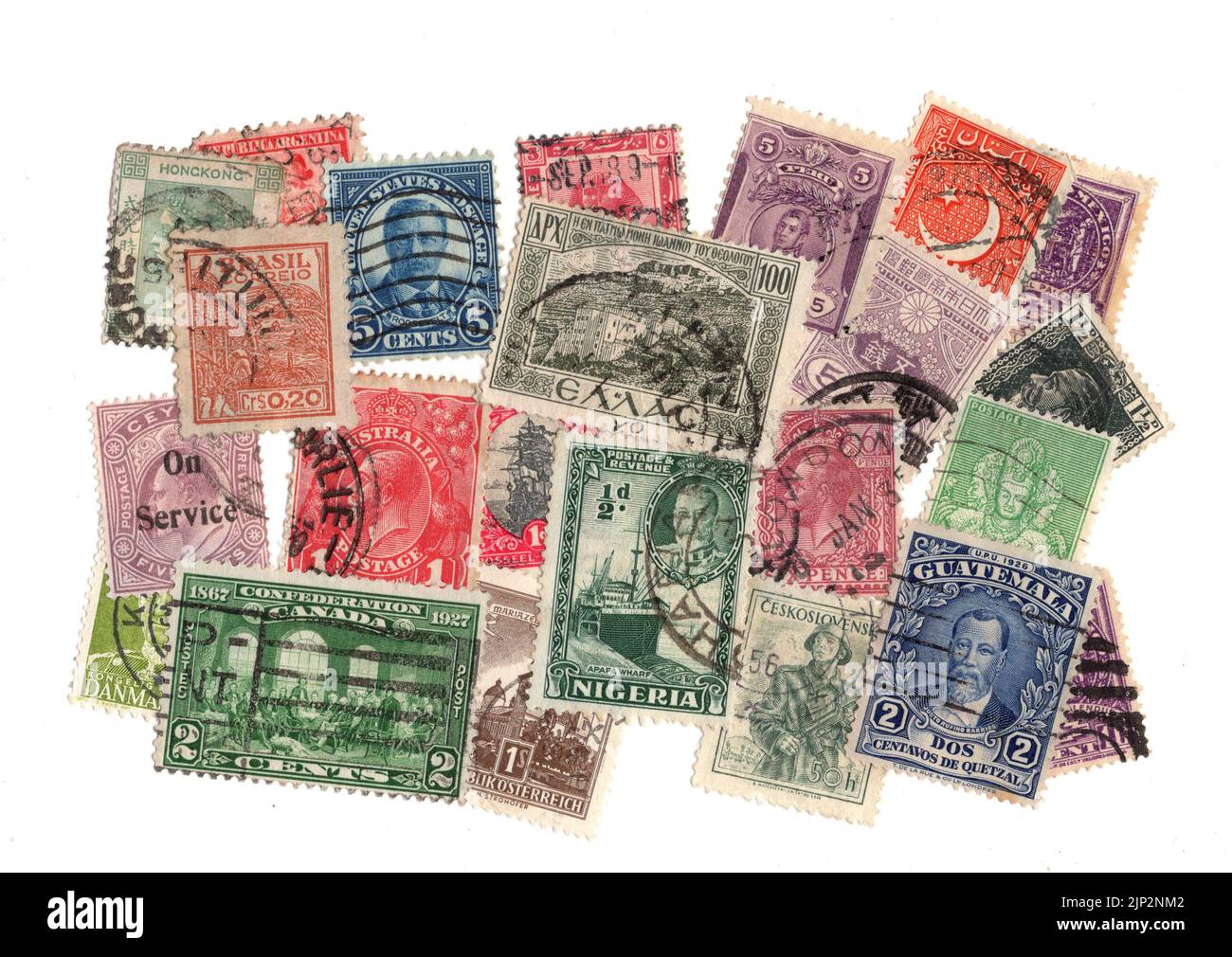 A montage of old postage stamps from around the world on a white ...