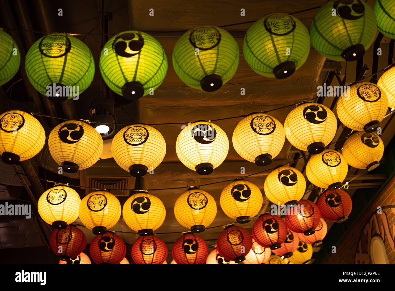 Colorful Japanese paper lamp hanging decoration over walking street in ...