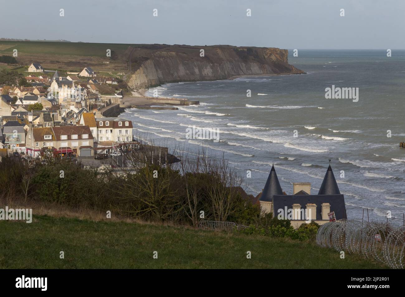 A scenic view of the coastal village of Arromanches in Normandy, France ...