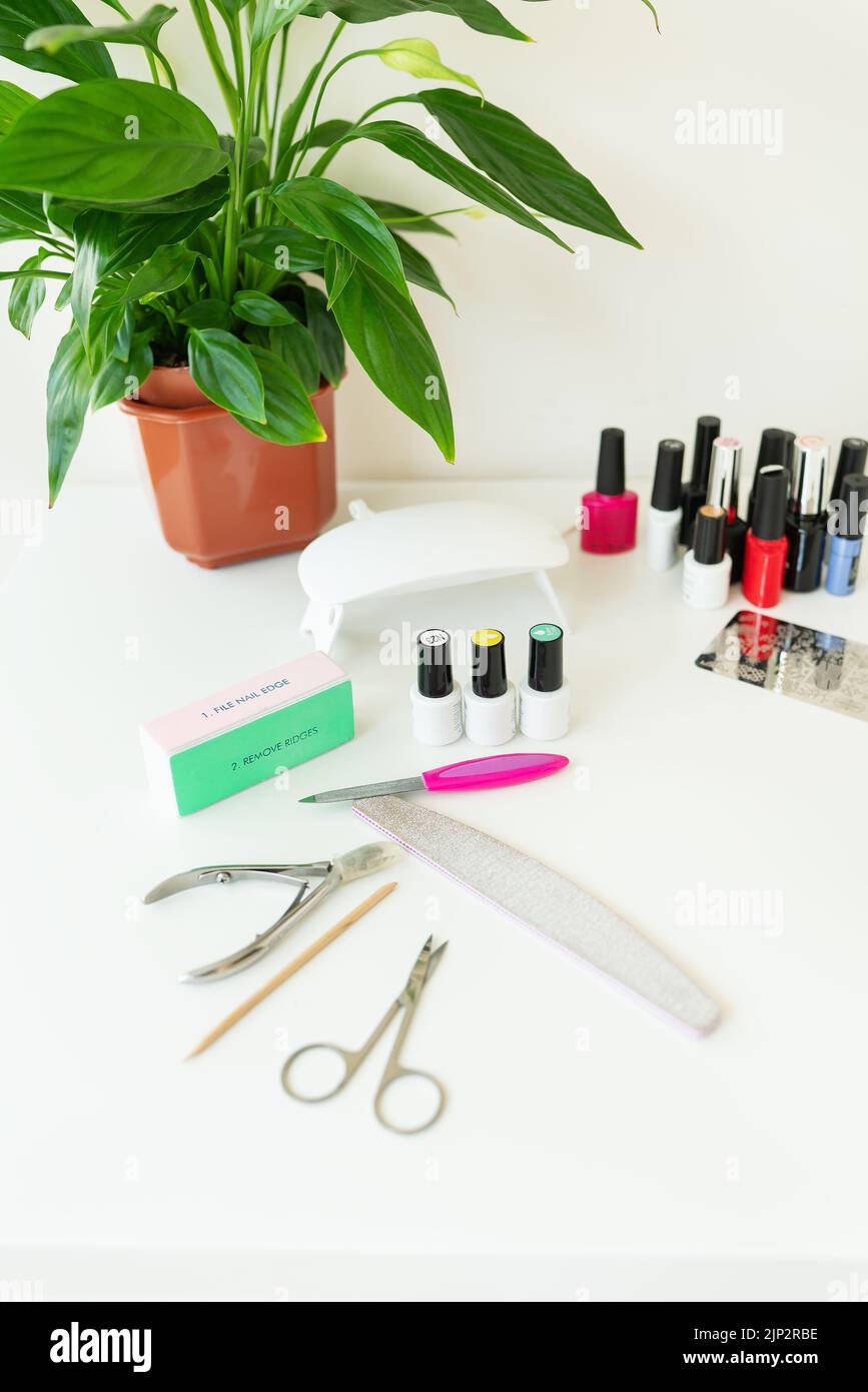 The concept of the workspace of the master of the nail salon. Top view ...