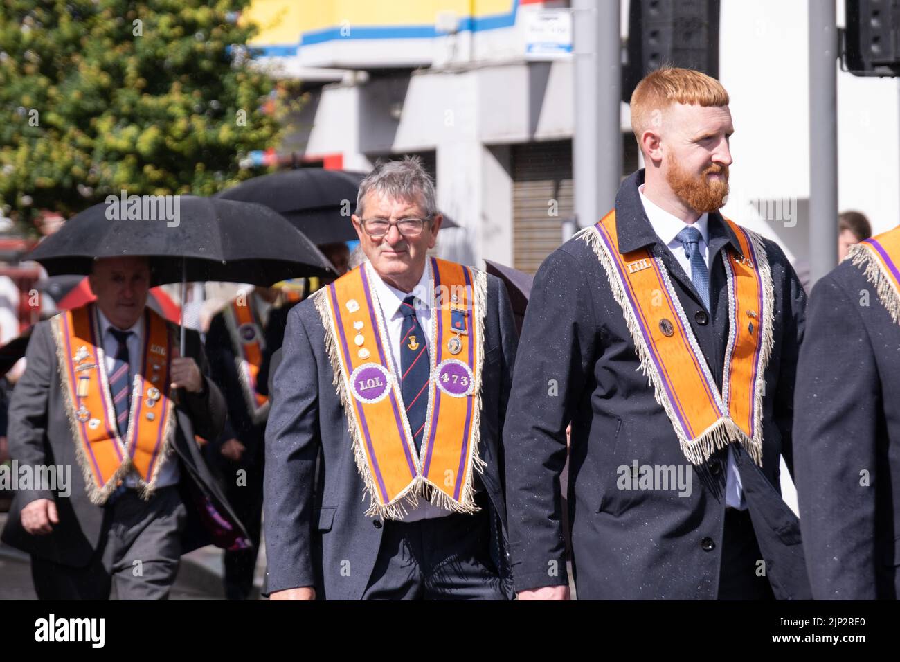Ballymena, UK, 25th Jun 2022. Orange Order parade makes it way along ...