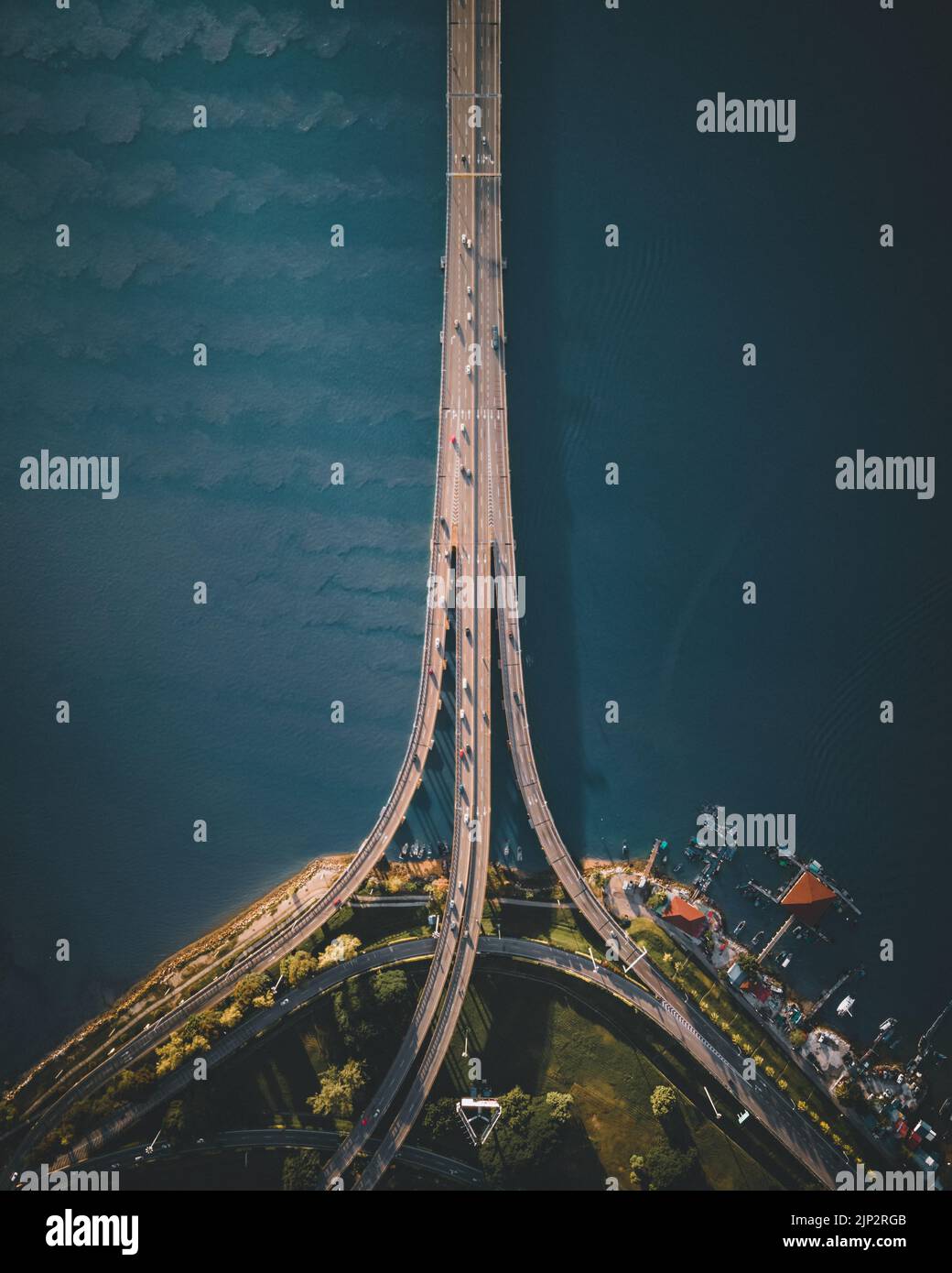 An aerial shot of the Penang Bridge in Malaysia crossing Penang Strait ...