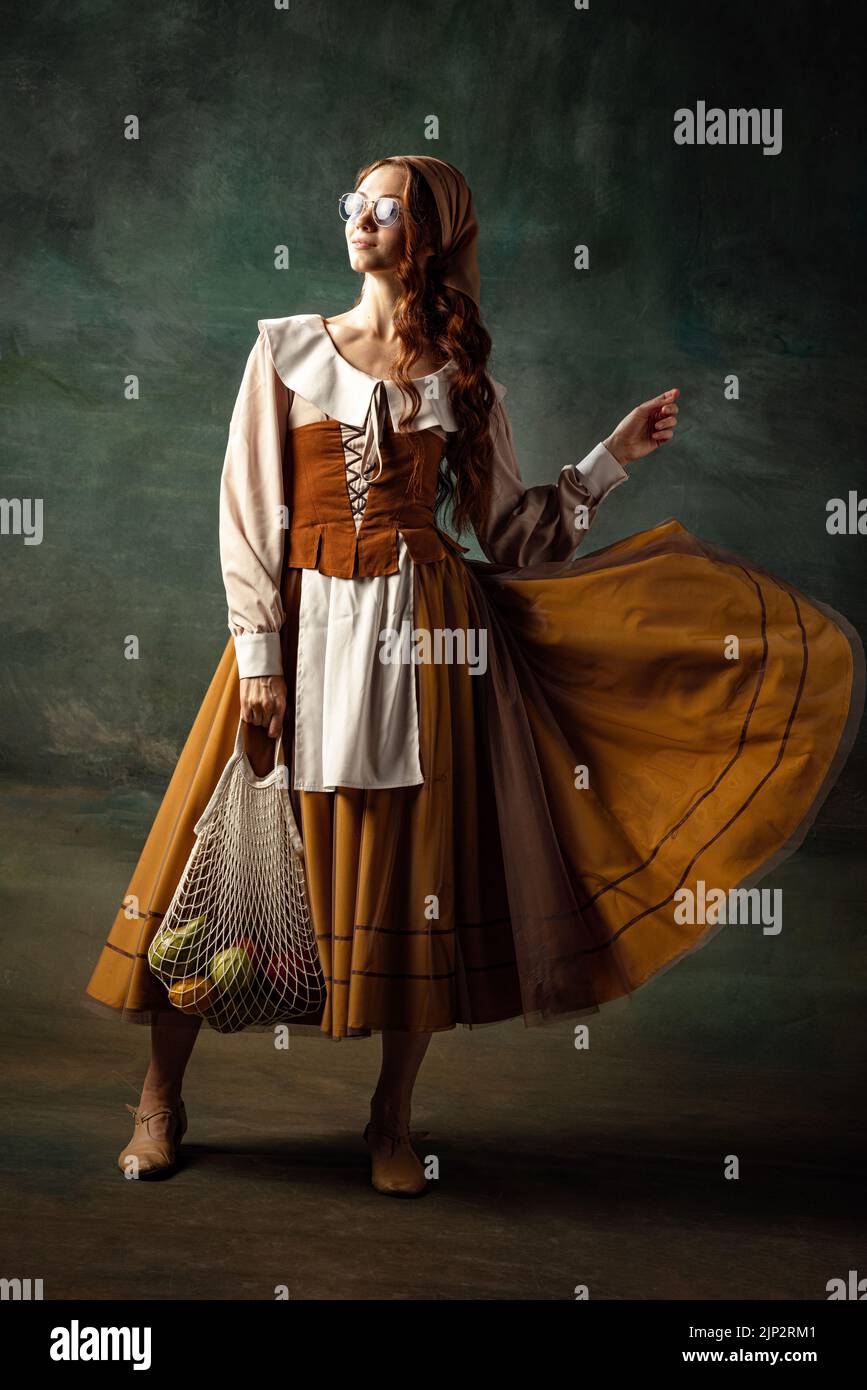 Eras comparison. Young atractive redhair girl with long curly hair like ...