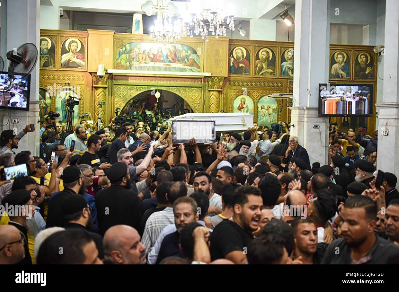 Cairo, Egypt. 15th Aug, 2022. People attend the funeral ceremony for ...