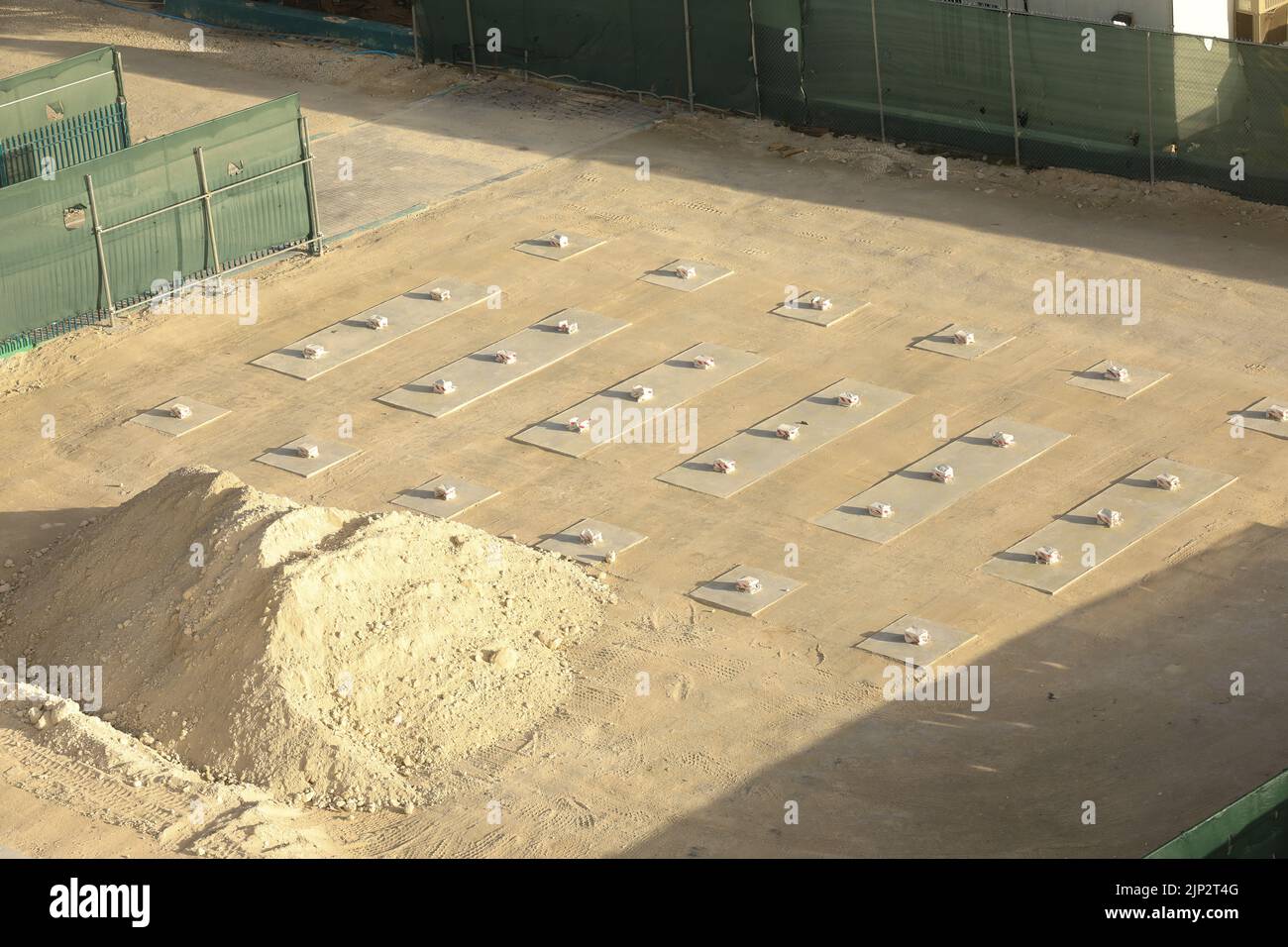 Piling driven into ground. Deep foundation installation. Reinforce ...