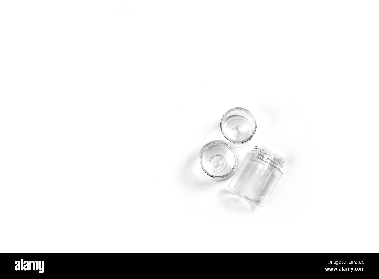 A top view of plastic jars isolated on white background Stock Photo - Alamy