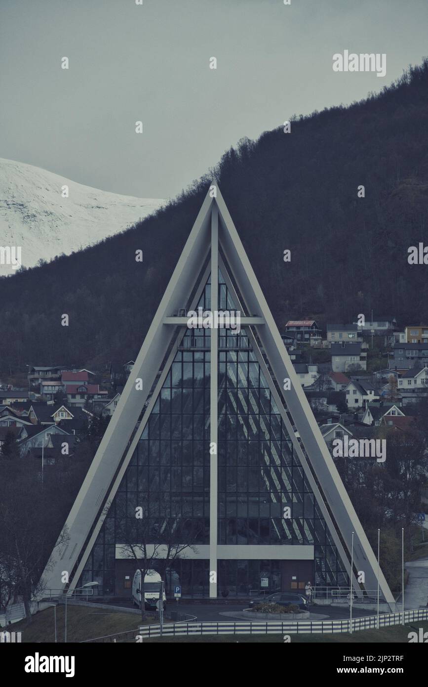 A vertical shot of the Tromsdalen church in tromso, Norway with ...