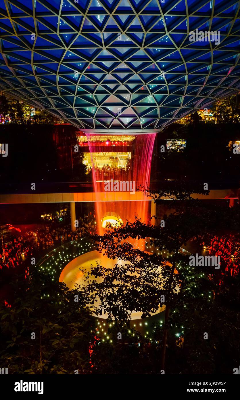 A beautiful high-angle of the Jewel waterfalls inside Changi Airport ...