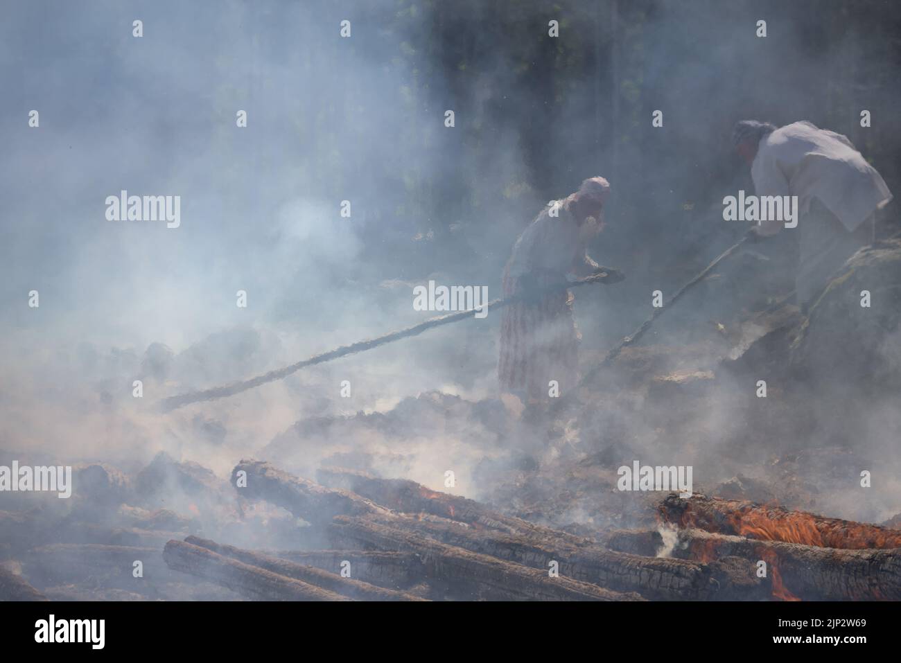 A group of people at the traditional Slash-And-Burn farming show in ...