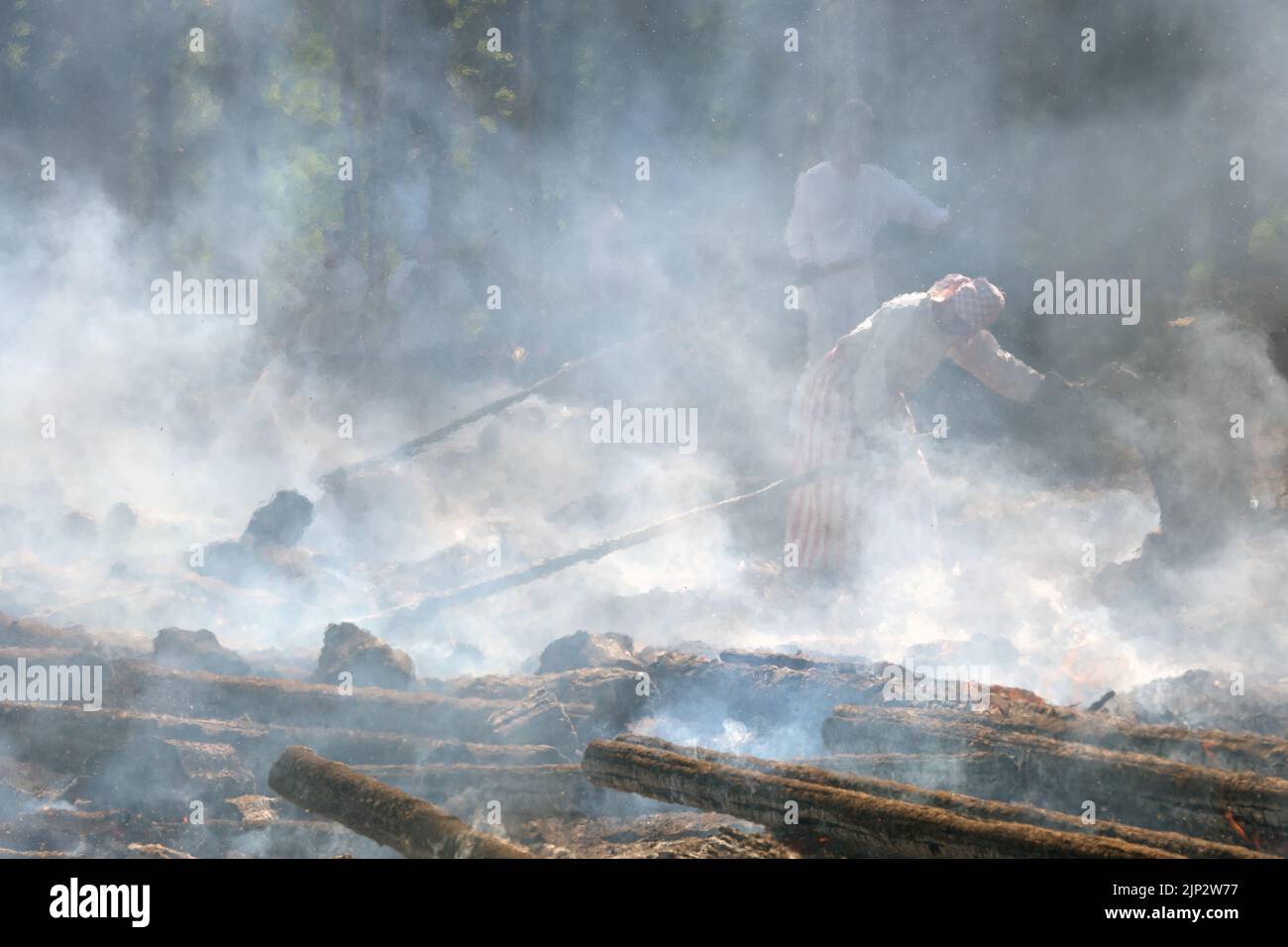 A group of people at the traditional Slash-And-Burn farming show in ...