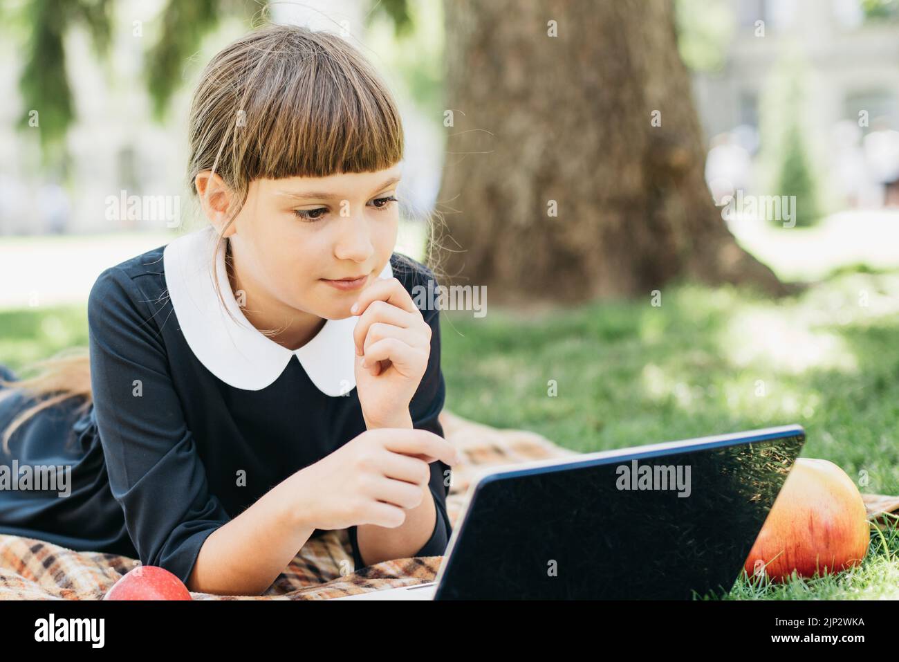 child with laptop computer. girl using pc. Life online. Surfing ...