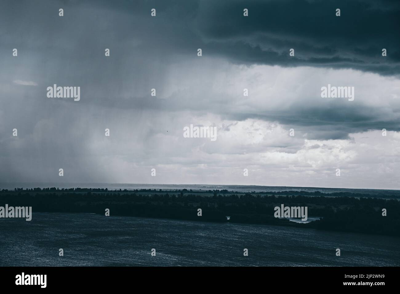 Rain clouds. Storm clouds sky rolling. Storm clouds with pouring rain ...