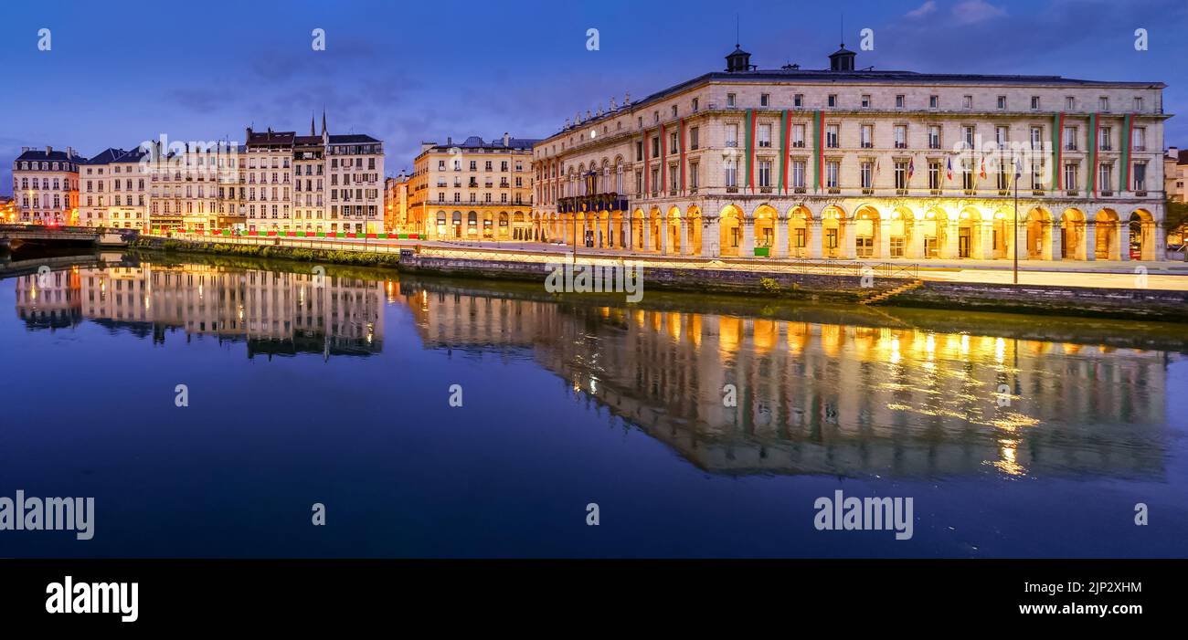 City of Bayonne in France at night with houses of typical architecture ...