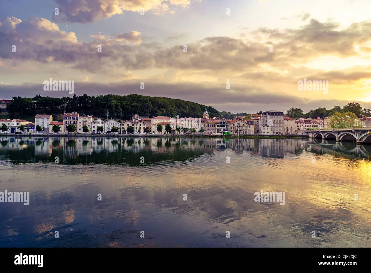 City of Bayonne in France at night with houses of typical architecture ...