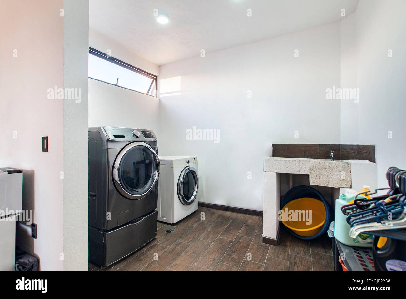 laundry room, with washing machine, dryer, detergent area, hand washing ...